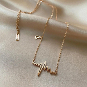Rose gold heartbeat necklace store