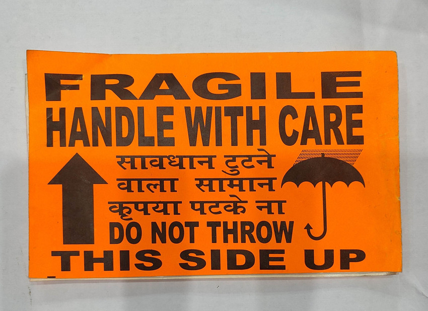 Handle With Care Logo In Hindi